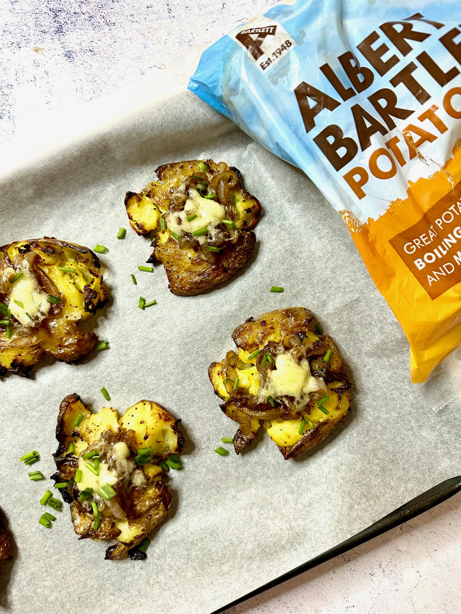 Smashed Potatoes with Caramelised Onions & Gruyere - Best Recipes UK